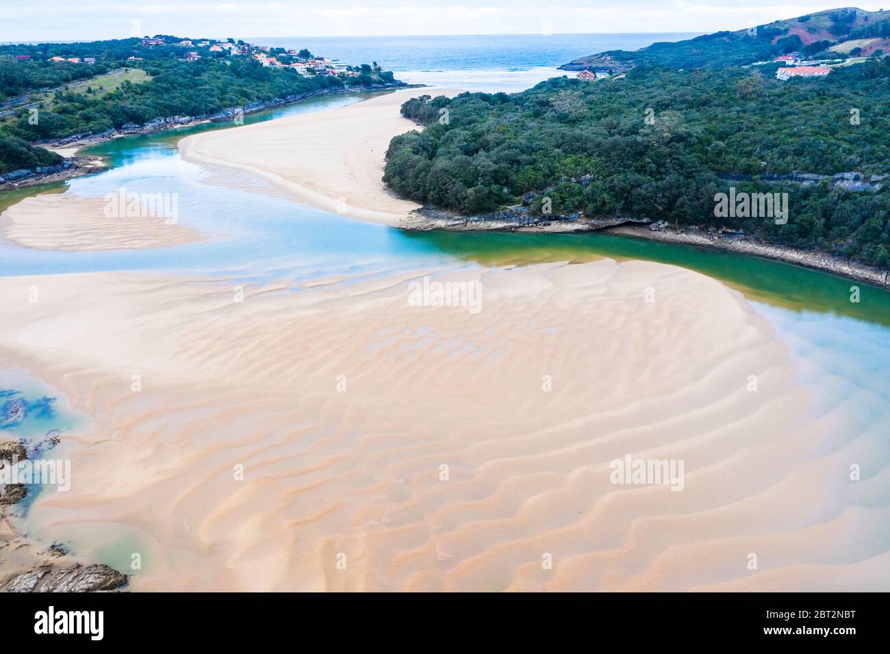 Sandy sediments in low tide in a river close to the sea Stock Photo - Alamy