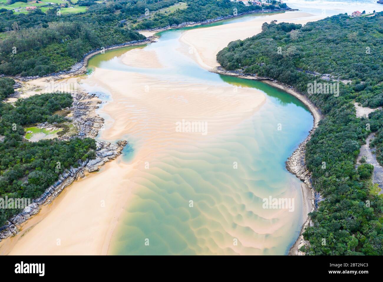Sandy sediments in low tide in a river close to the sea Stock Photo - Alamy
