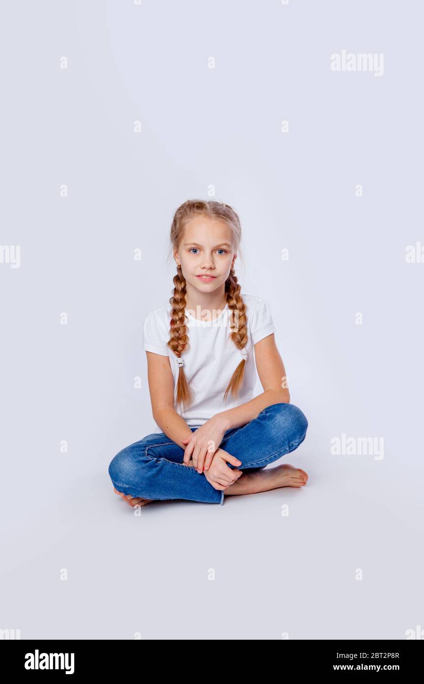 Teenage Girl In Jeans And A T Shirt Stock Photo Alamy