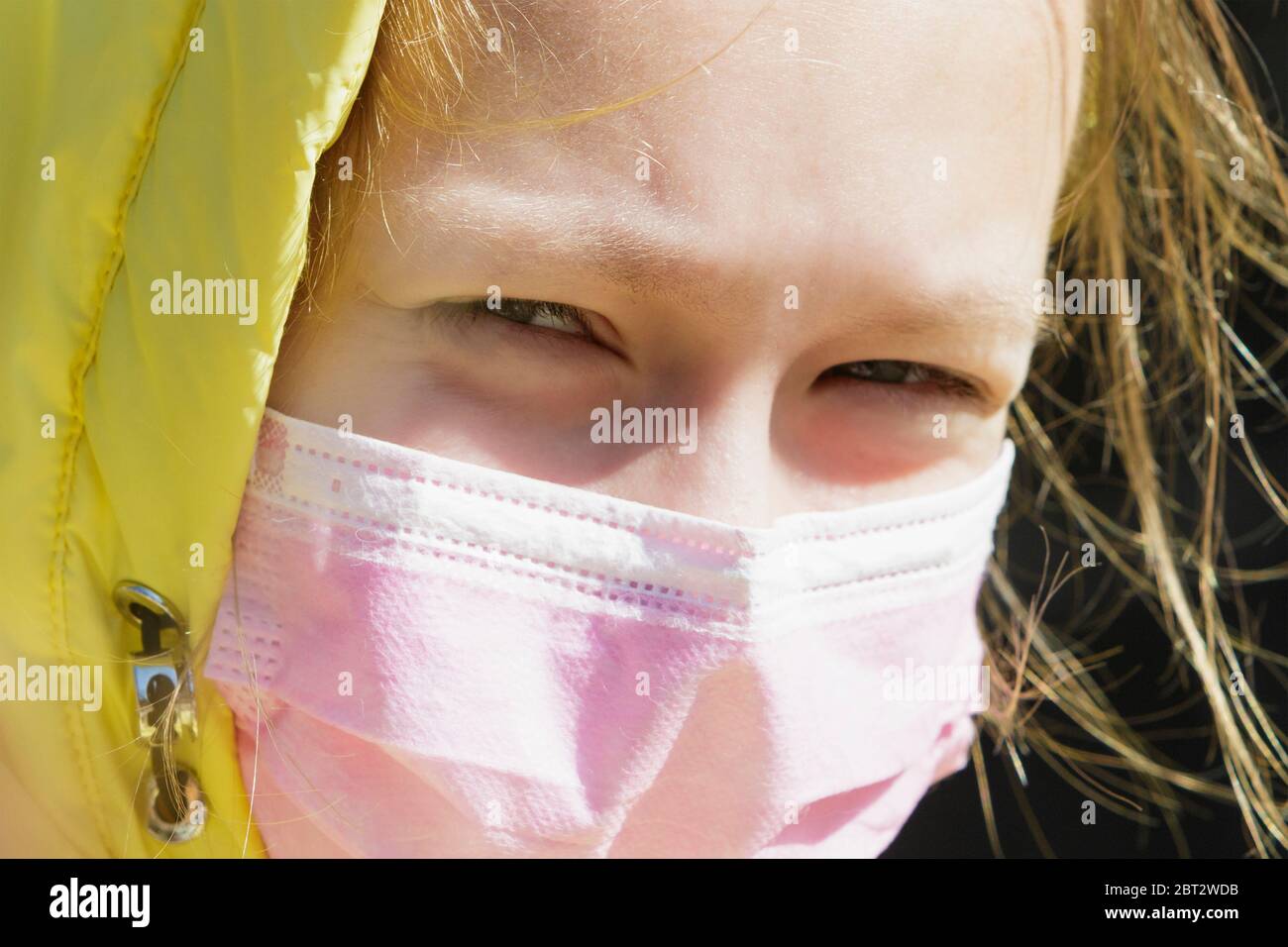 Girl in a pink mask hi-res stock photography and images - Alamy