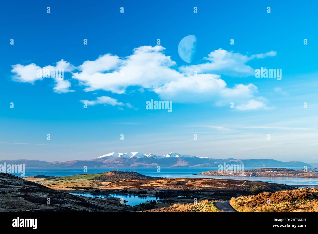 The Arran Hills early mornoing in winter snow capped and a small half ...
