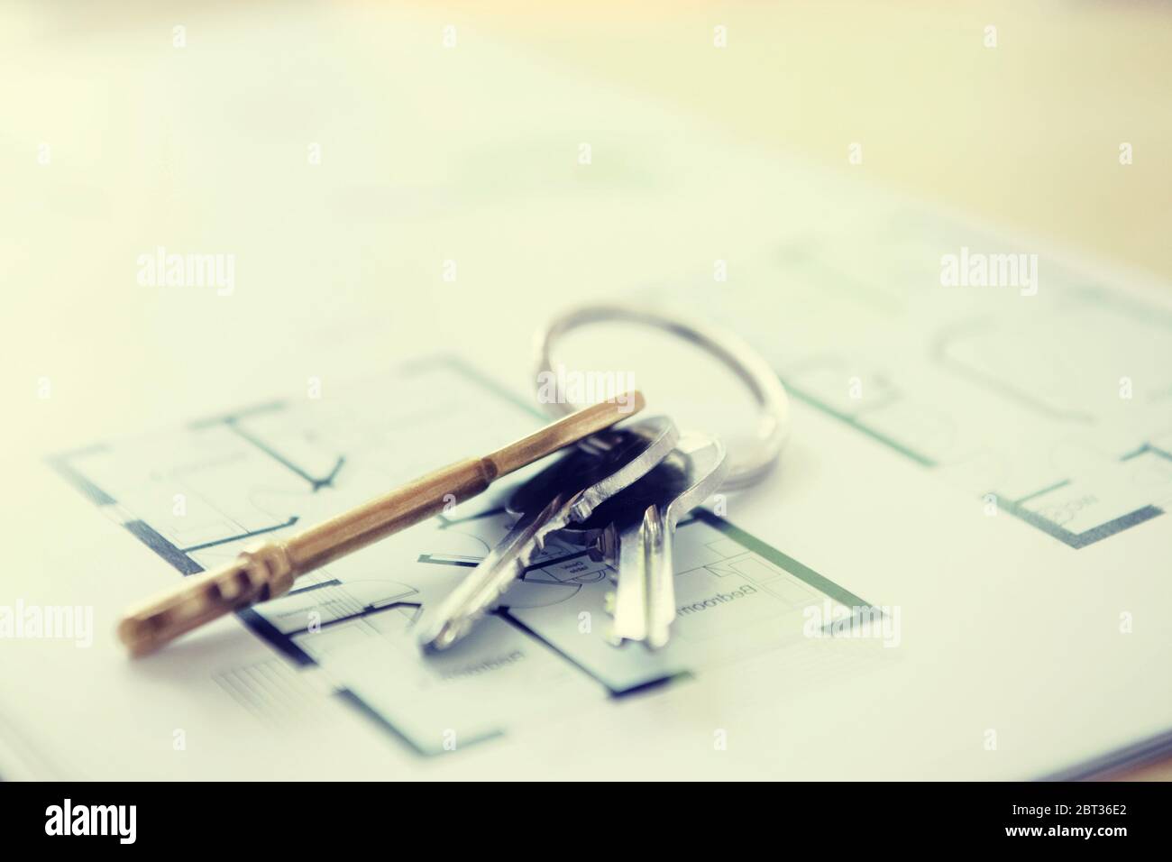 Keys on apartment floor plans Stock Photo - Alamy