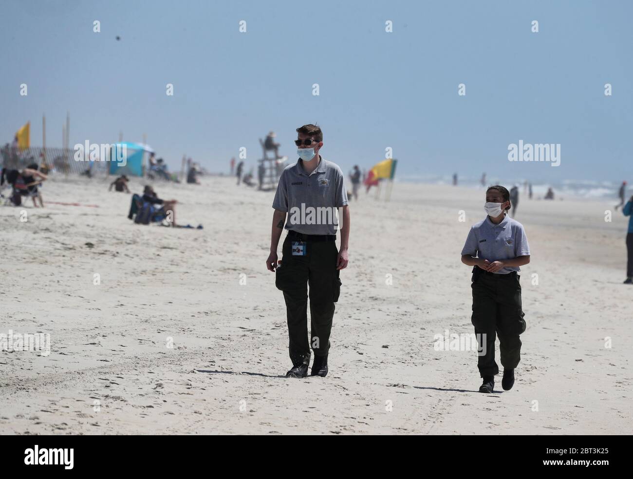 New York, USA. 22nd May, 2020. Park rangers patrol on the beach at ...