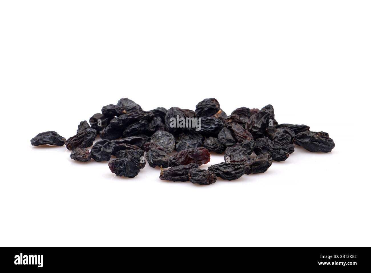Organic Black raisin isolated on white background Stock Photo - Alamy