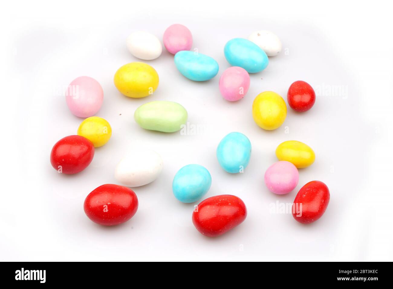 Color dragee isolated on white background Stock Photo - Alamy