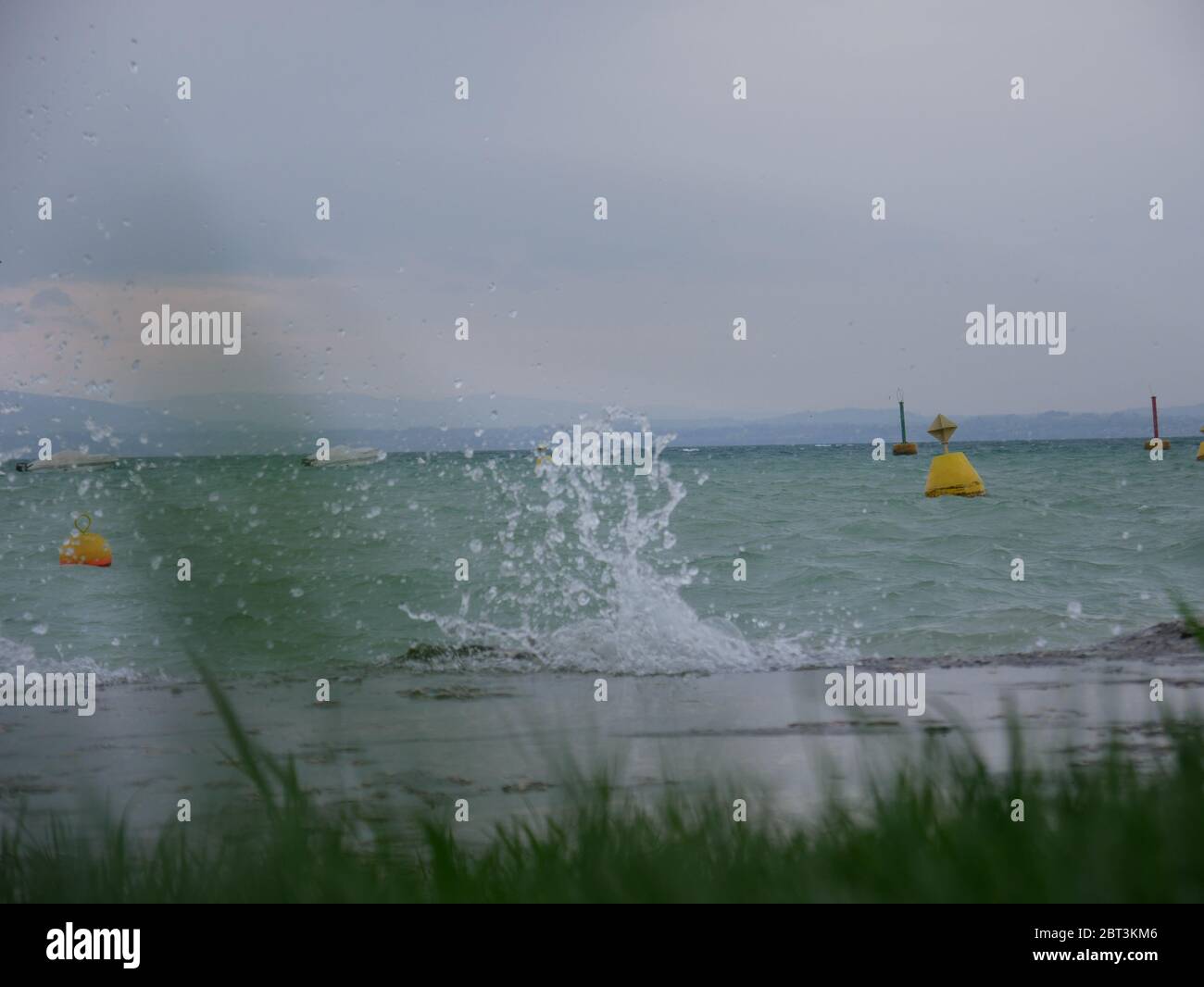 Water splashing of a coast on a sea Stock Photo - Alamy