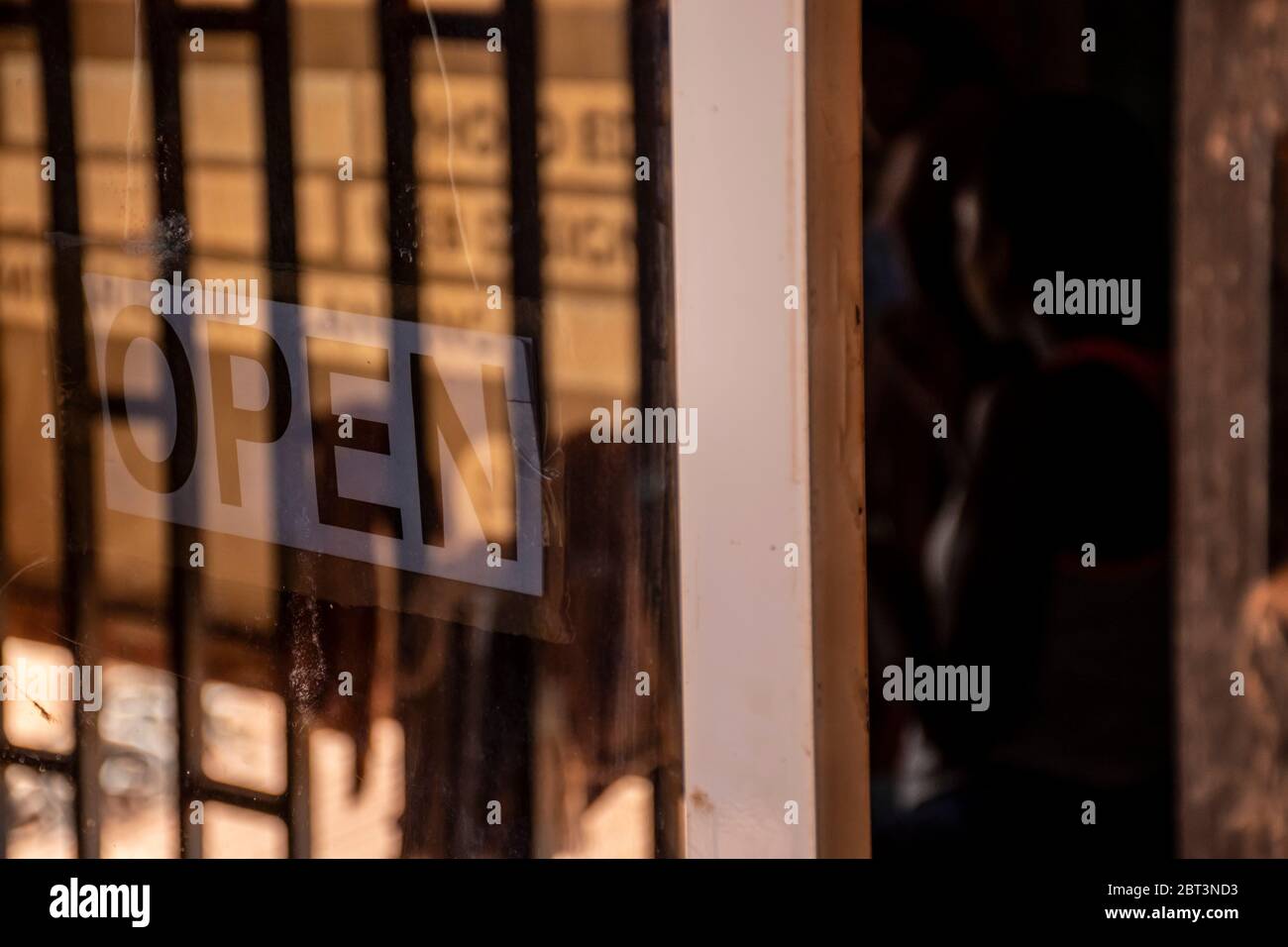 local african business store with open sign hanging in front Stock ...