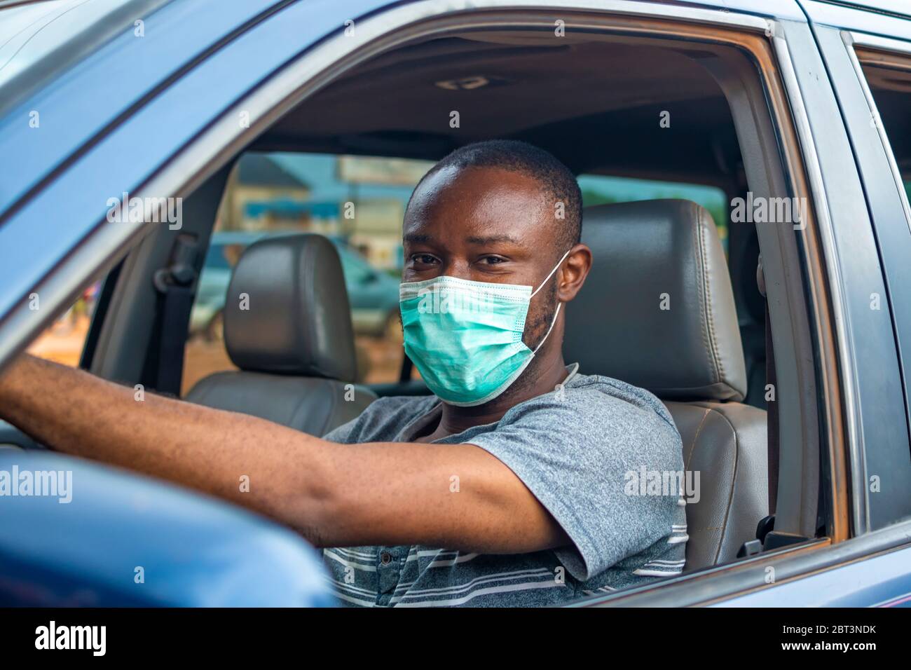 African man driving hi-res stock photography and images - Alamy
