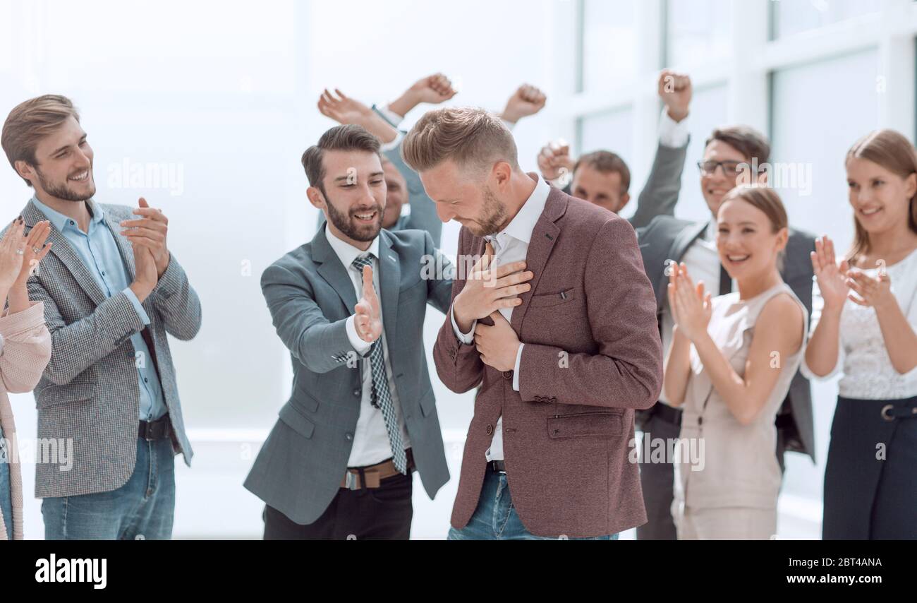 happy project Manager accepting congratulations of his colleagues Stock ...