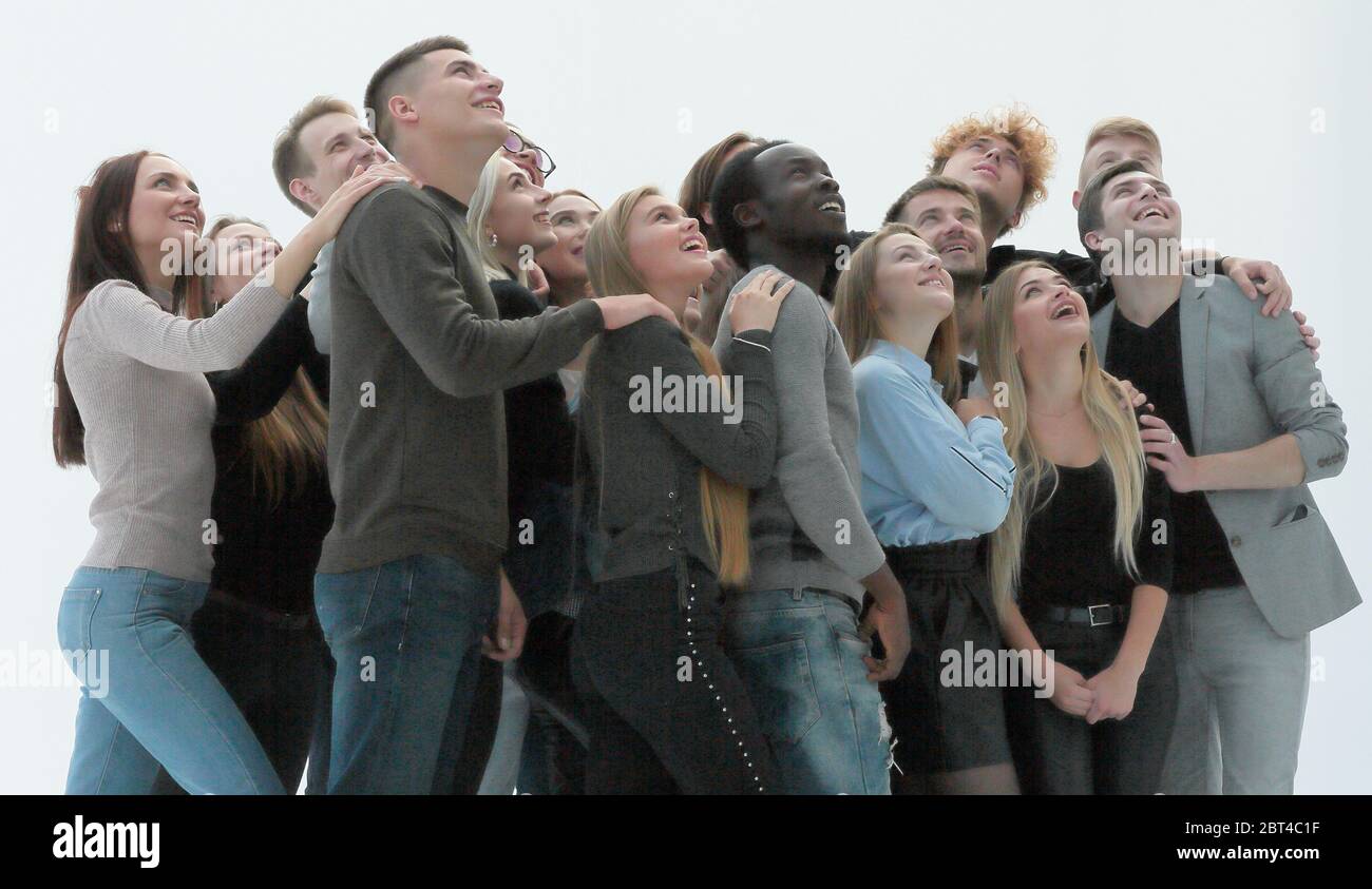 group of young people pointing up . isolated on white Stock Photo - Alamy