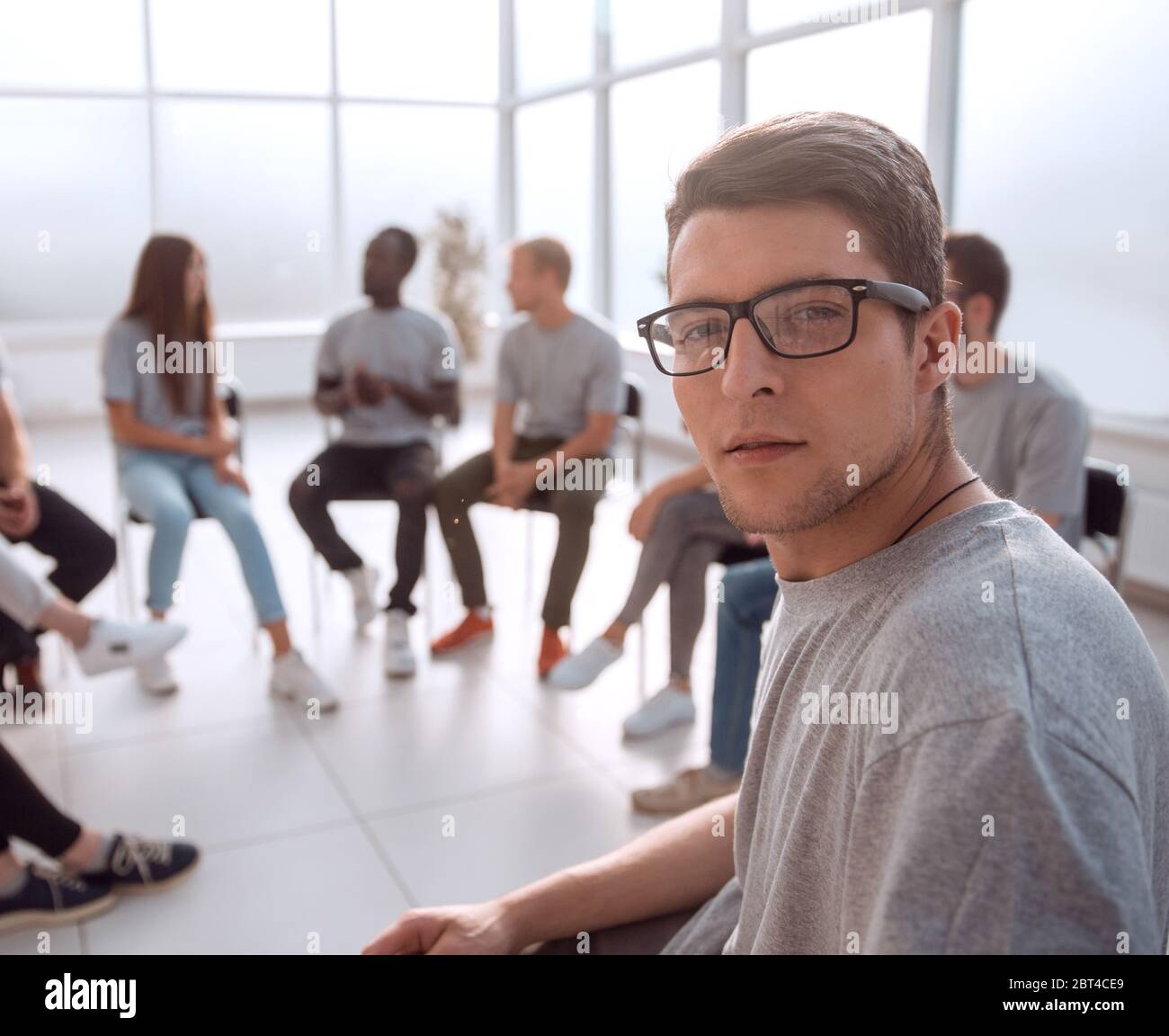 professional business coach sitting in a team building class Stock ...