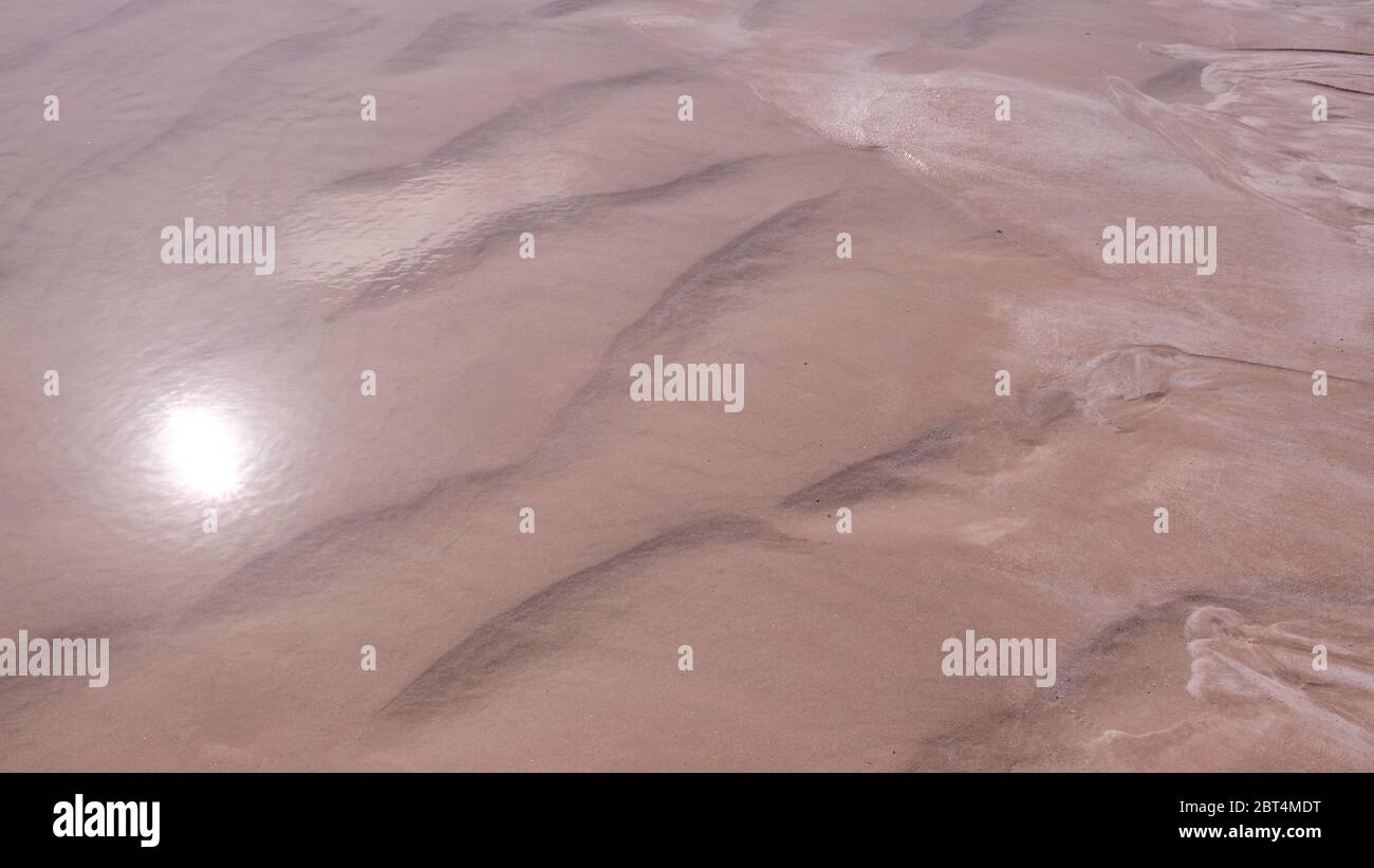 Brown sand texture as abstract background. Sand patterns Stock Photo ...