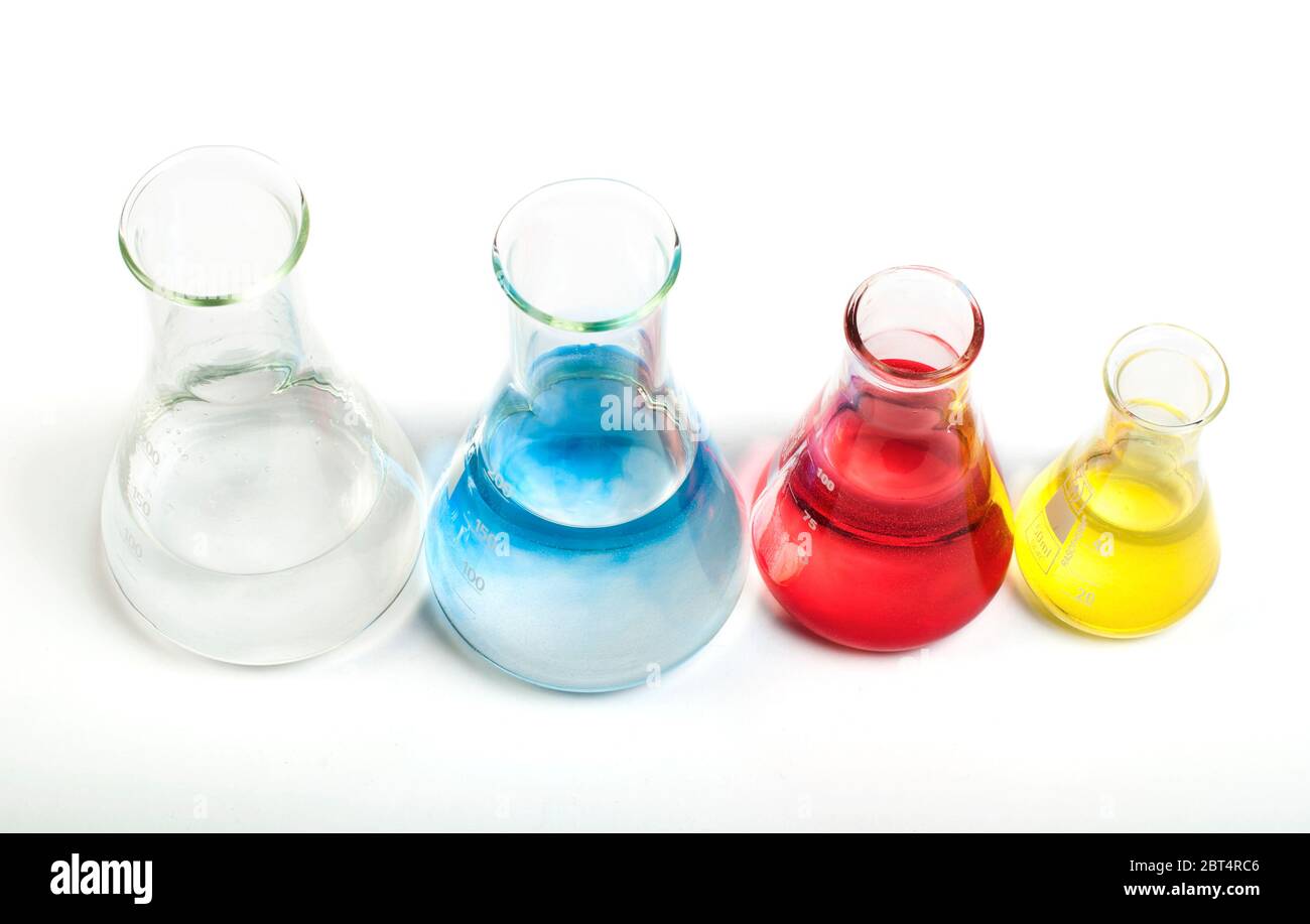 Laboratory equipment and color chemicals on white background Stock ...