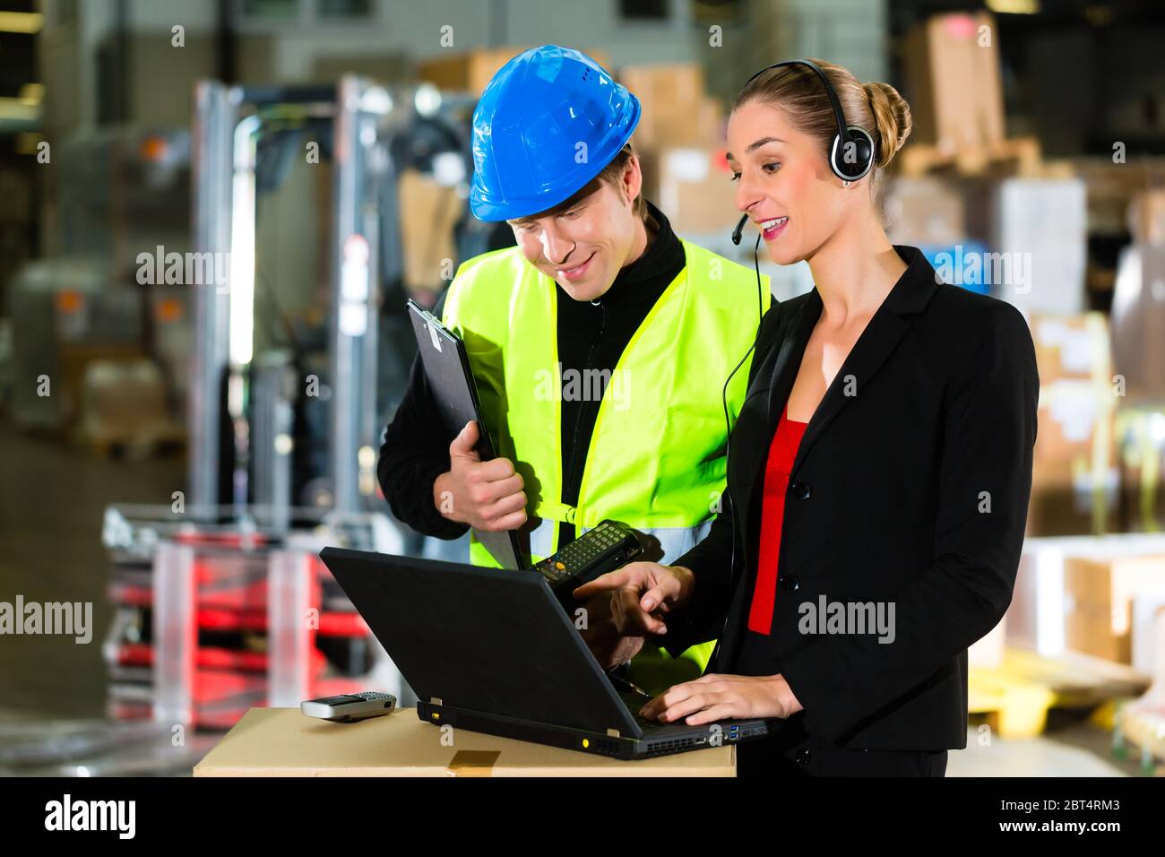 teamwork - warehouse or warehouse workers and account manager with ...