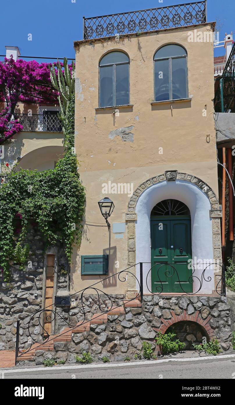 Arch Door at Small Yellow House in Positano Italy Stock Photo - Alamy