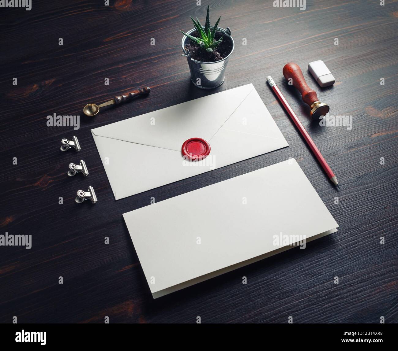 Vintage envelope and retro stationery on wooden background Stock Photo ...