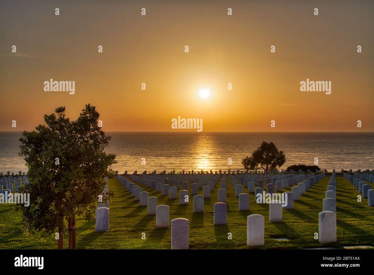 Sunset at a National Cemetery Stock Photo - Alamy