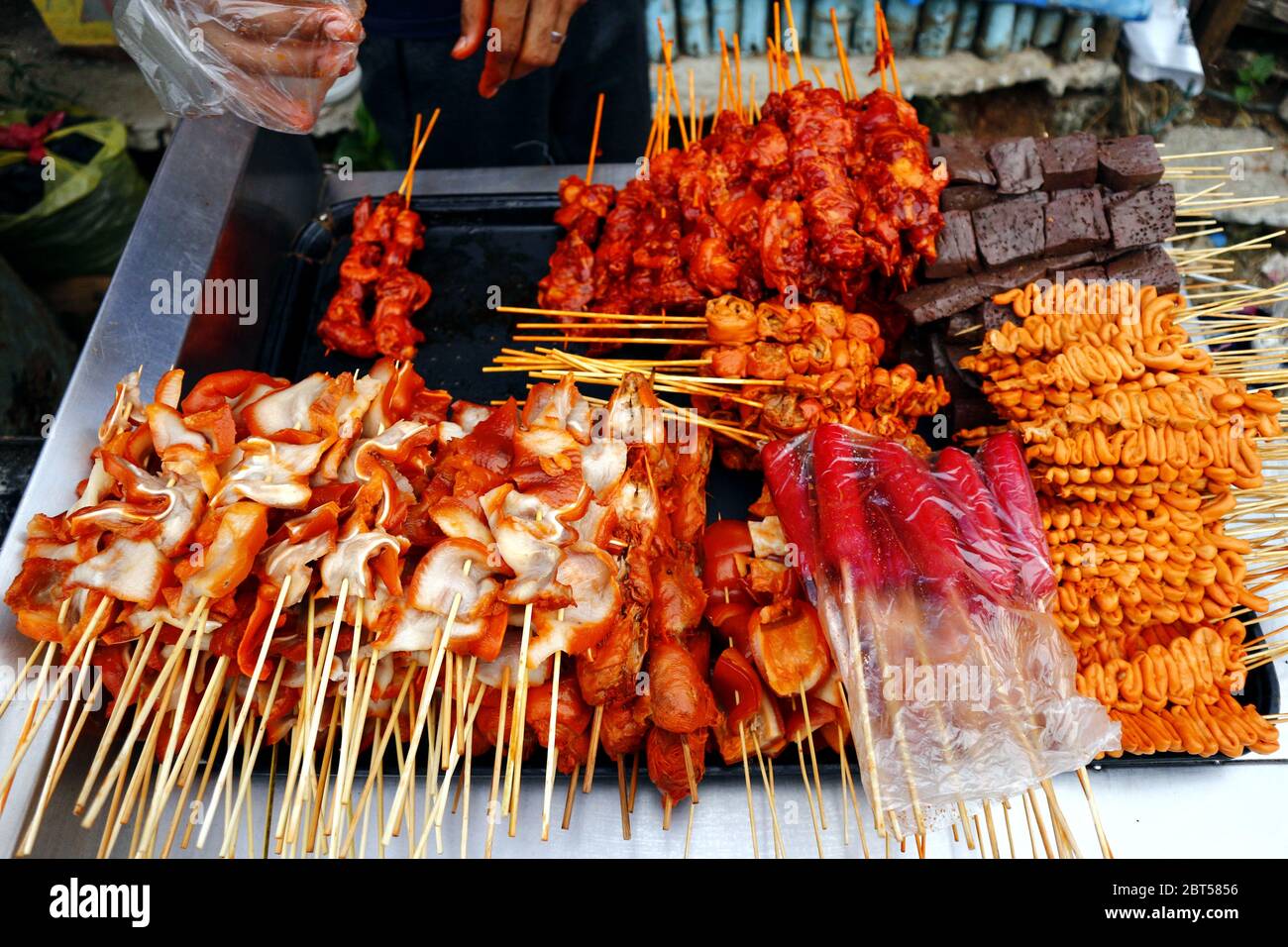 Photo of assorted grilled pork and chicken innards barbecue at a street ...