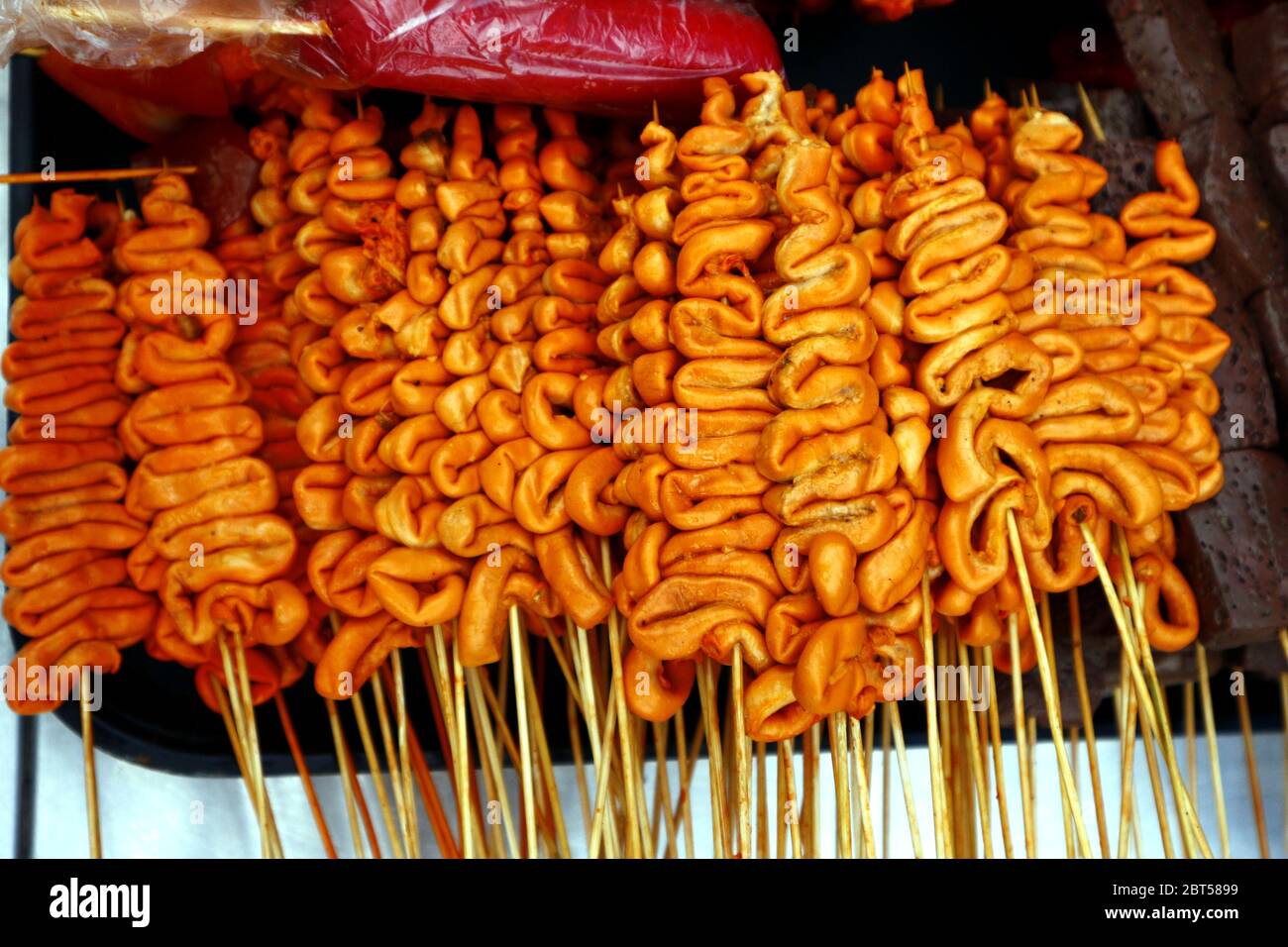 Photo of assorted grilled pork and chicken innards barbecue at a street ...