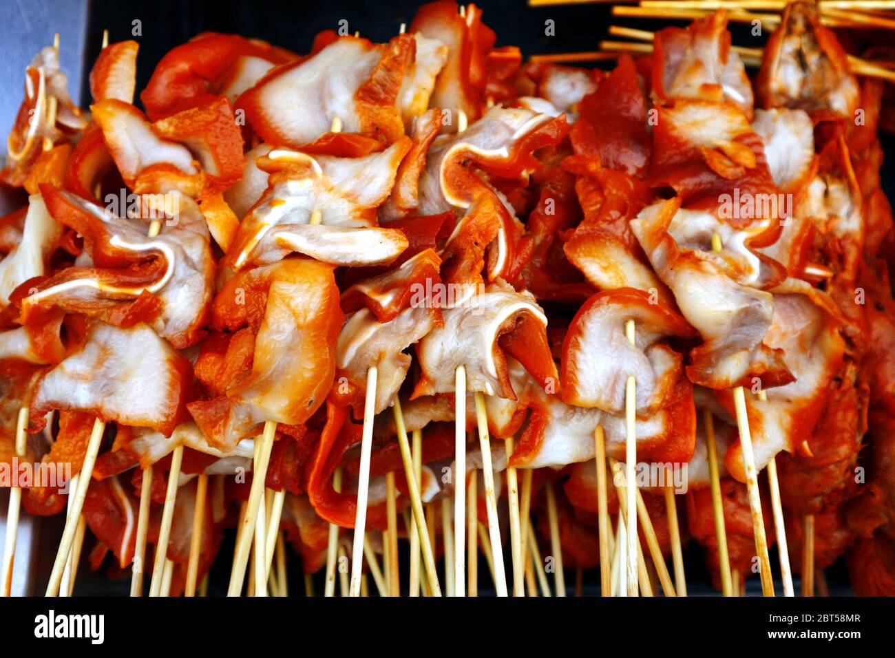 Photo of assorted grilled pork and chicken innards barbecue at a street ...