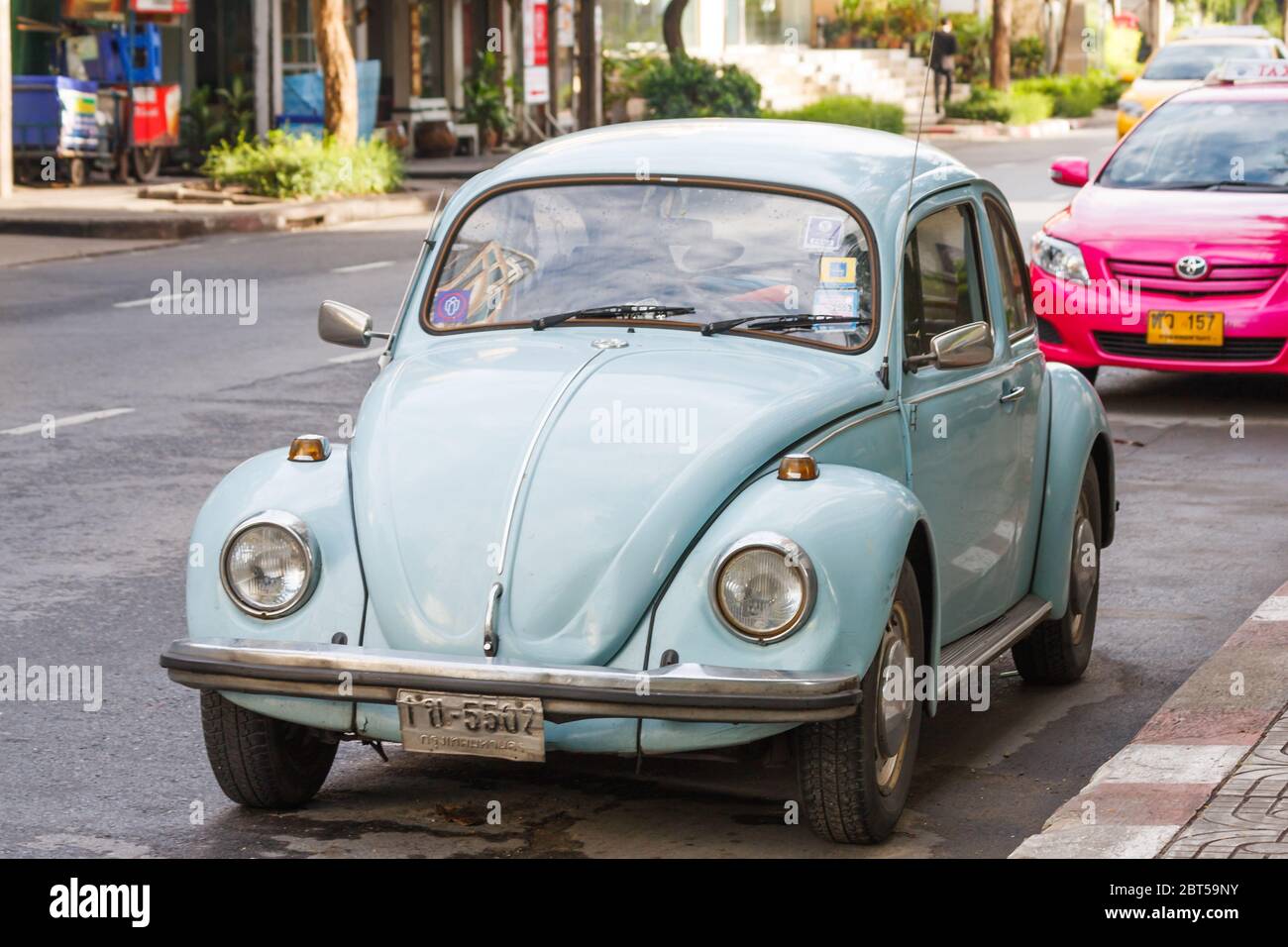 Bangkok, Thailand - September 20th 2009: A pale blue Volkswagen Beetle ...