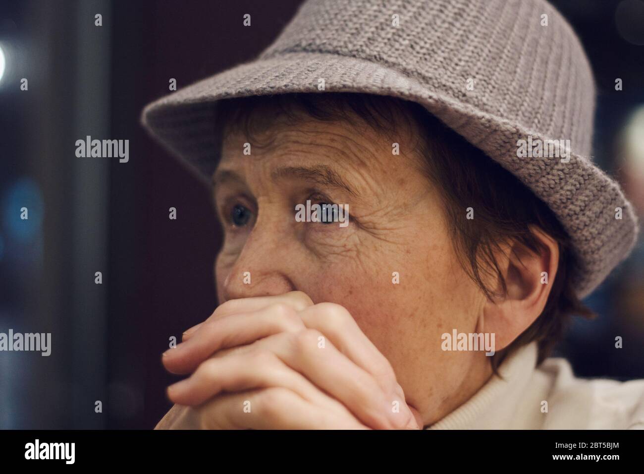 Closeup portrait of sad Caucasian old woman. Beautiful pensive upset ...