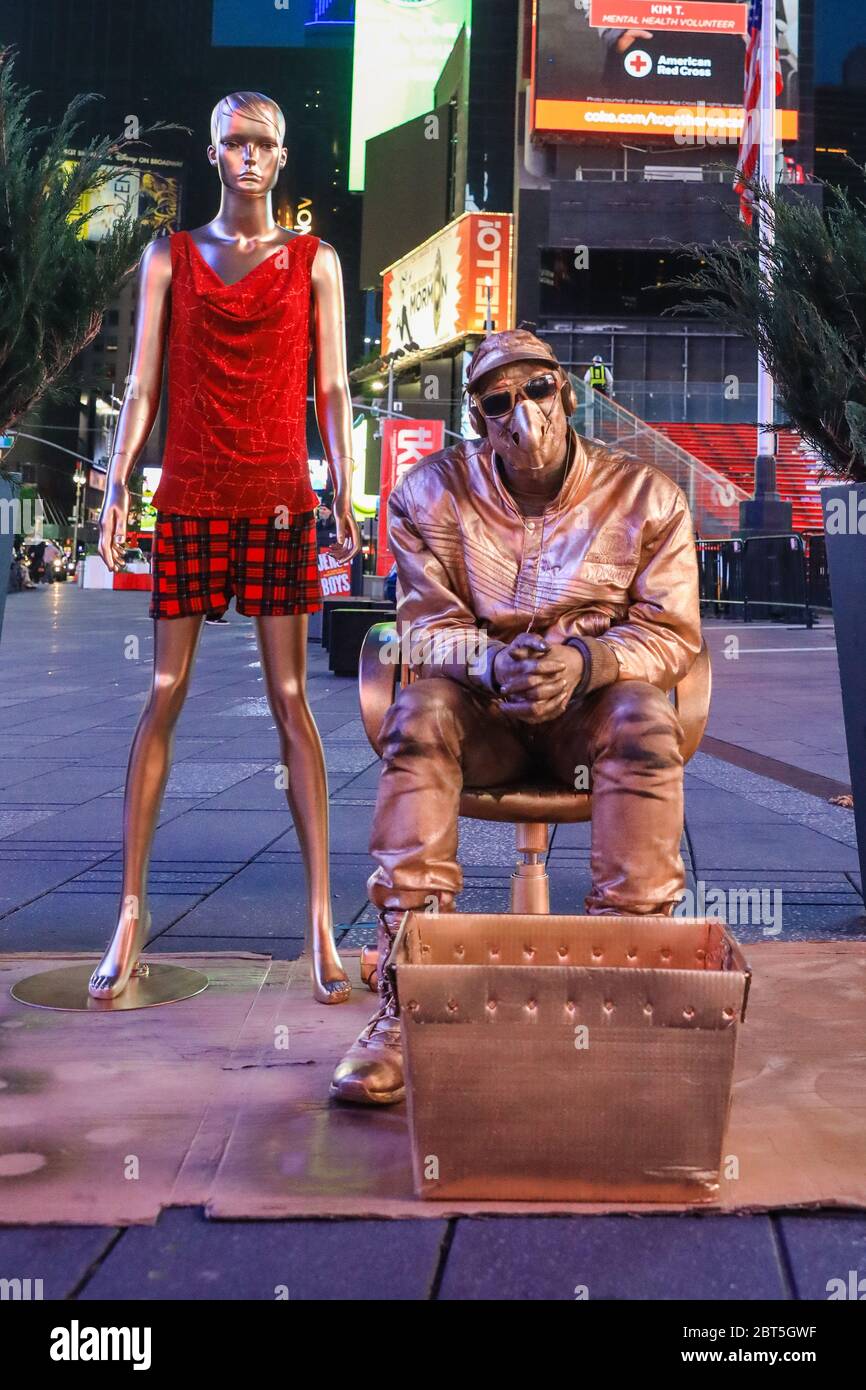 New York, United States. 22nd May, 2020. Man dressed in golden human ...