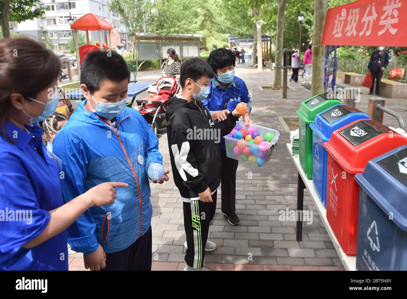 Beijing, China. 23rd May, 2020. Two children play an educational ...