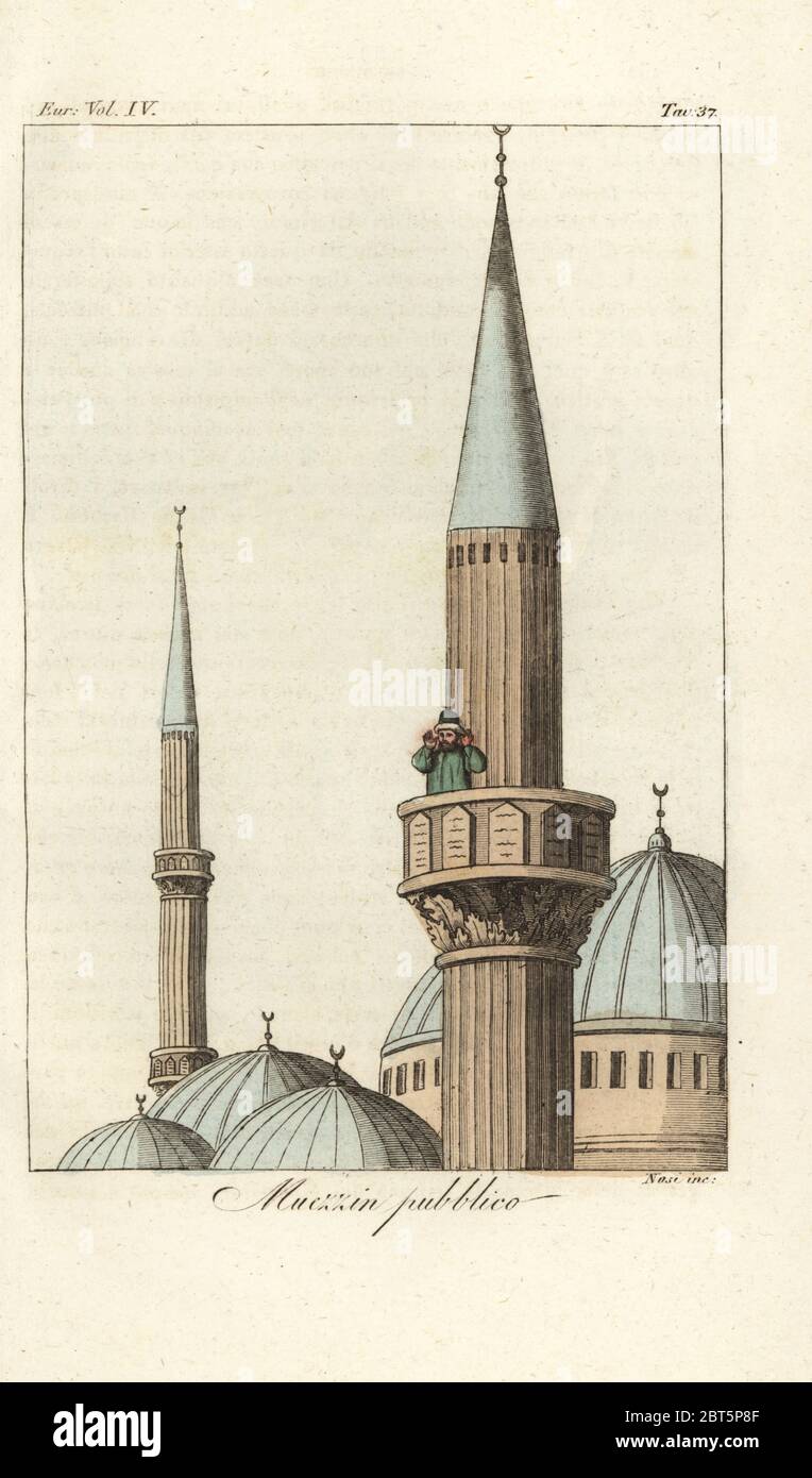 Muezzin in a minaret of a mosque performing the call to prayer or adhan ...