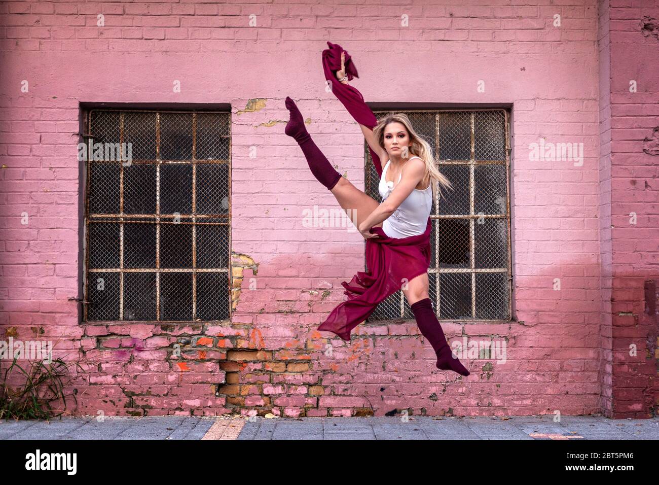 Ballet dancer girl jump on the street Stock Photo - Alamy