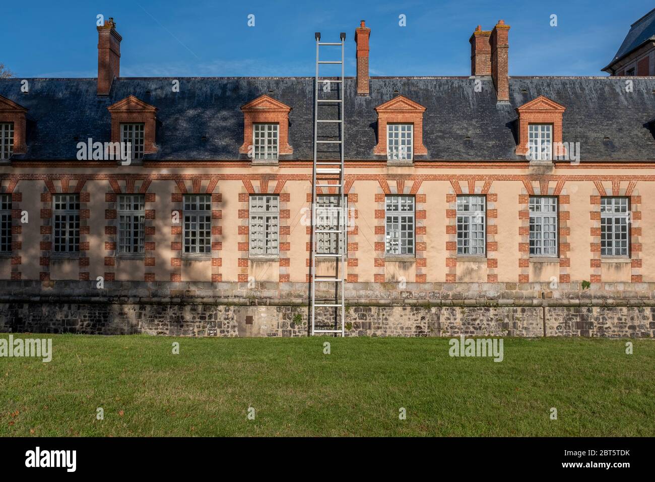Oversized ladder on french country castle aisle. Photo taken in late ...
