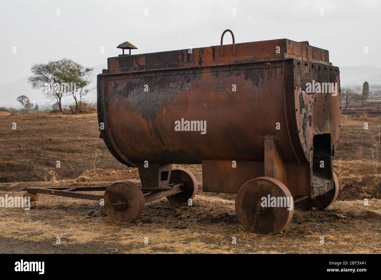 a mobile tar melting furnace with a tank above to melt the tar or ...