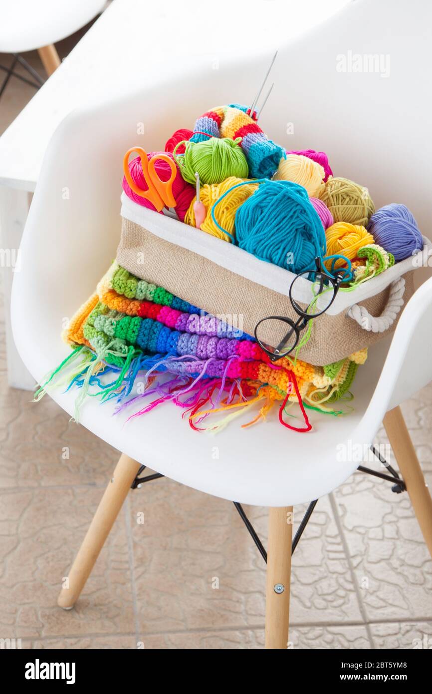 Women's hobby. Needlework and crocheting and knitting. Bright yarn in ...