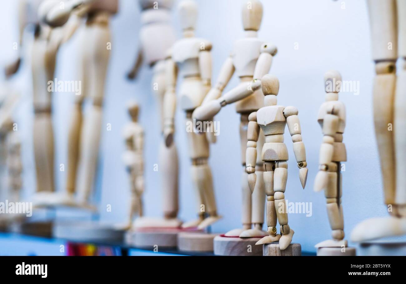 Wooden human artistic action figures at stationery store Stock Photo ...