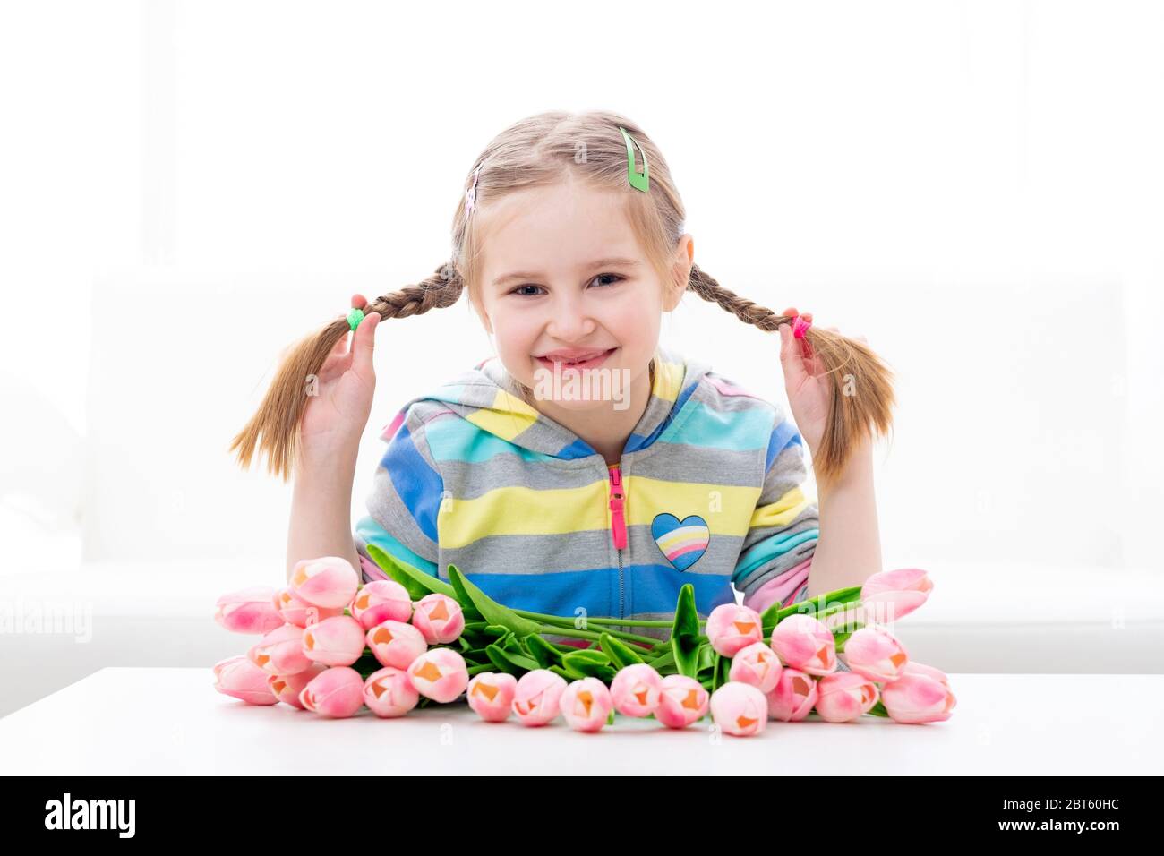 Little adorable girl love her wonderful fresh flower bouquet, isolated ...