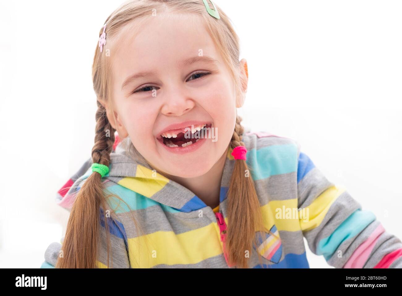 Funny school-aged child express pure happiness, close-up, isolated on ...