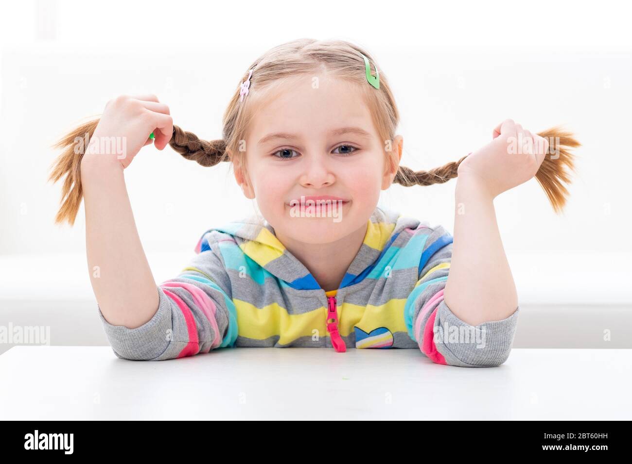 Pigtail braids hi-res stock photography and images - Alamy