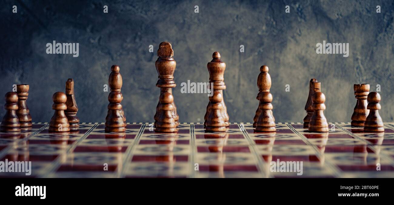 Classic wooden chess figures with reflection on board in front Stock ...