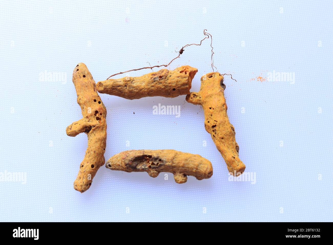 Fresh Dried Turmeric root isolated on a white background Stock Photo ...