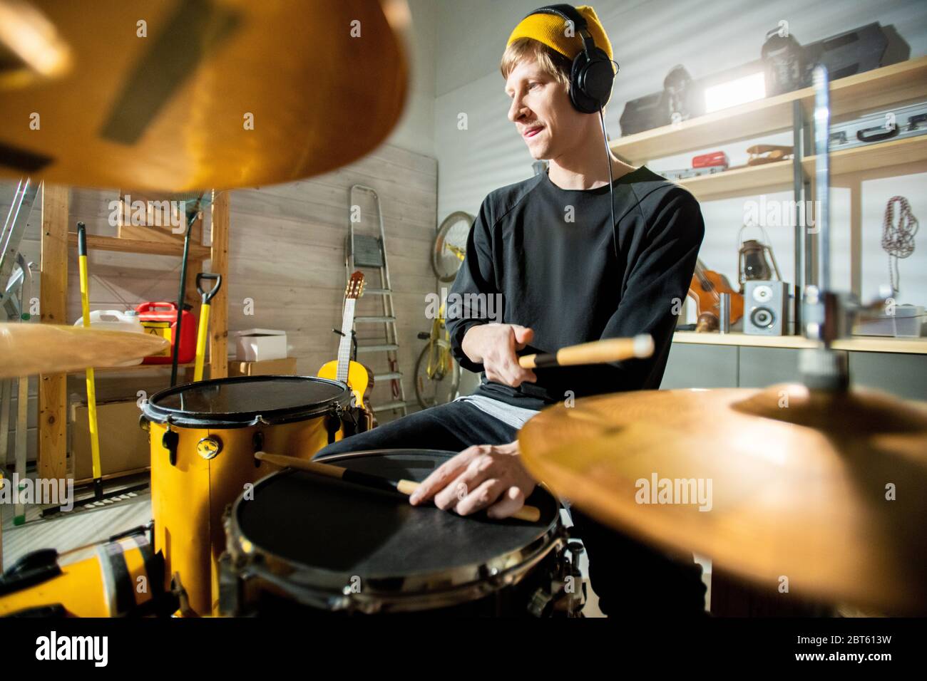 Young man with drumsticks hi-res stock photography and images - Alamy