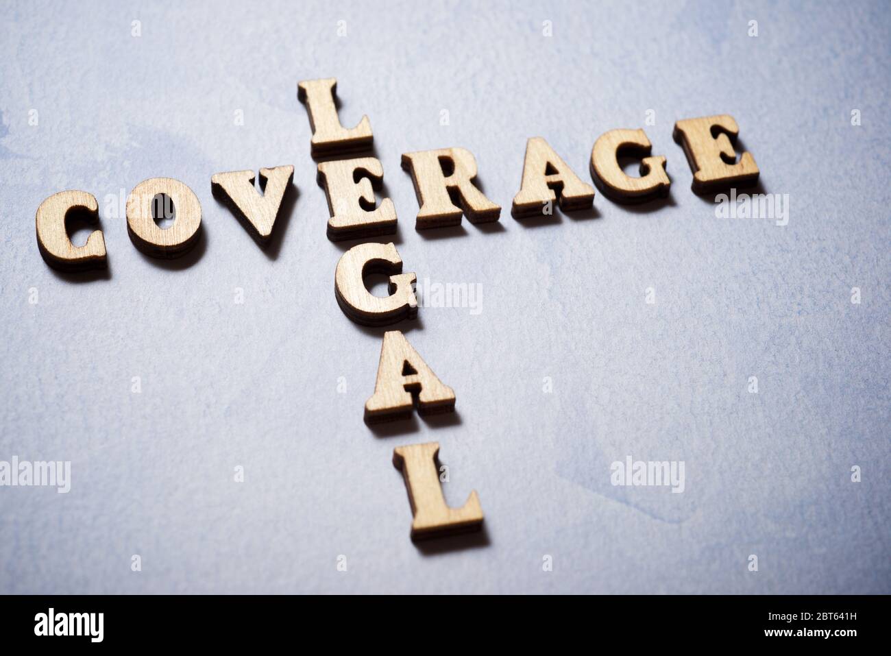 Legal coverage text in a colored paper Stock Photo - Alamy