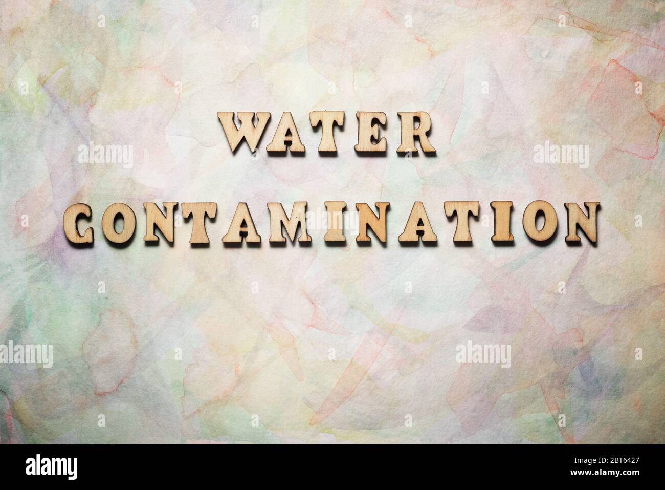 Water Contamination text in a colored paper Stock Photo - Alamy