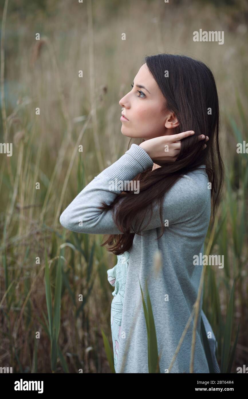 Beautiful woman alone Stock Photo - Alamy