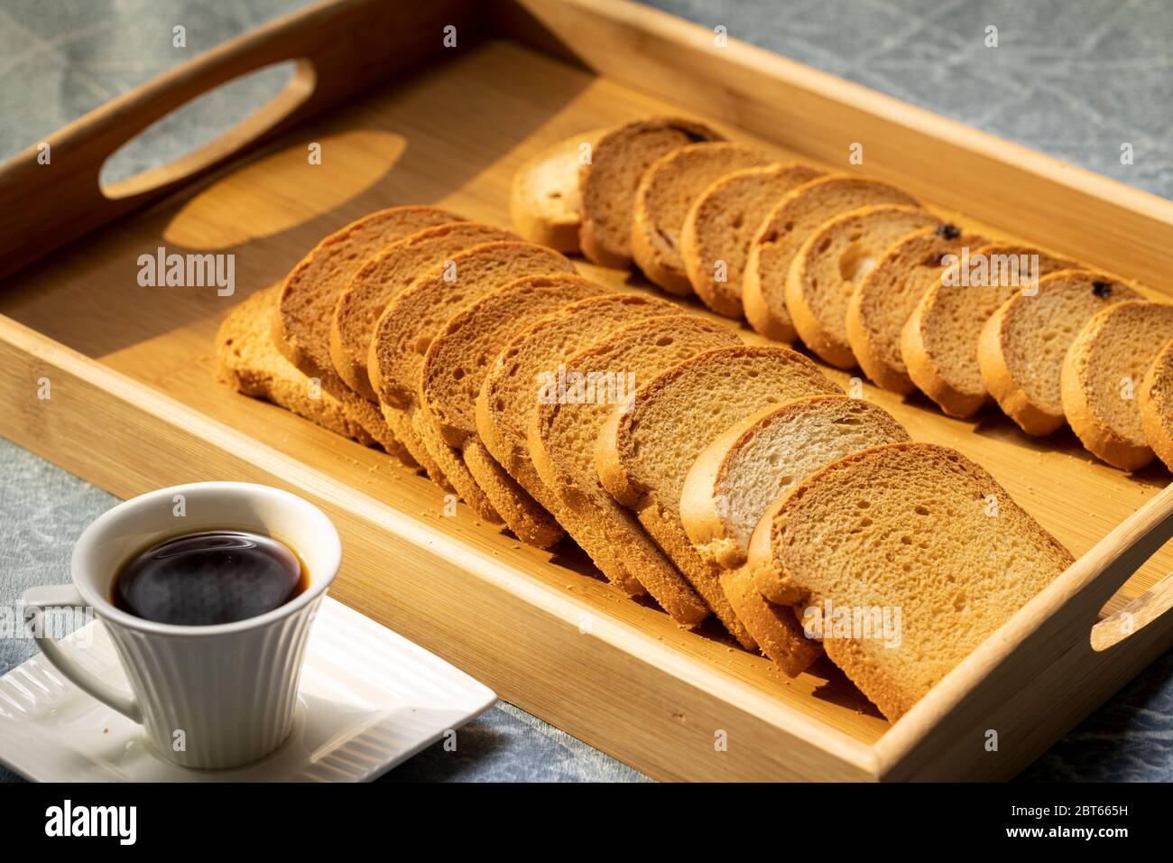 Crispy tea rusks placed nicely on a tray with nice cup of arabic coffee ...