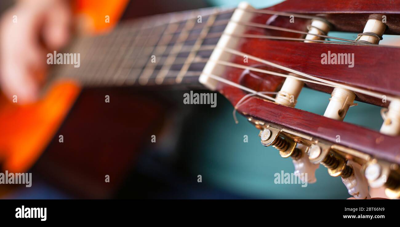 guitar neck close-up. playing an instrument Stock Photo - Alamy
