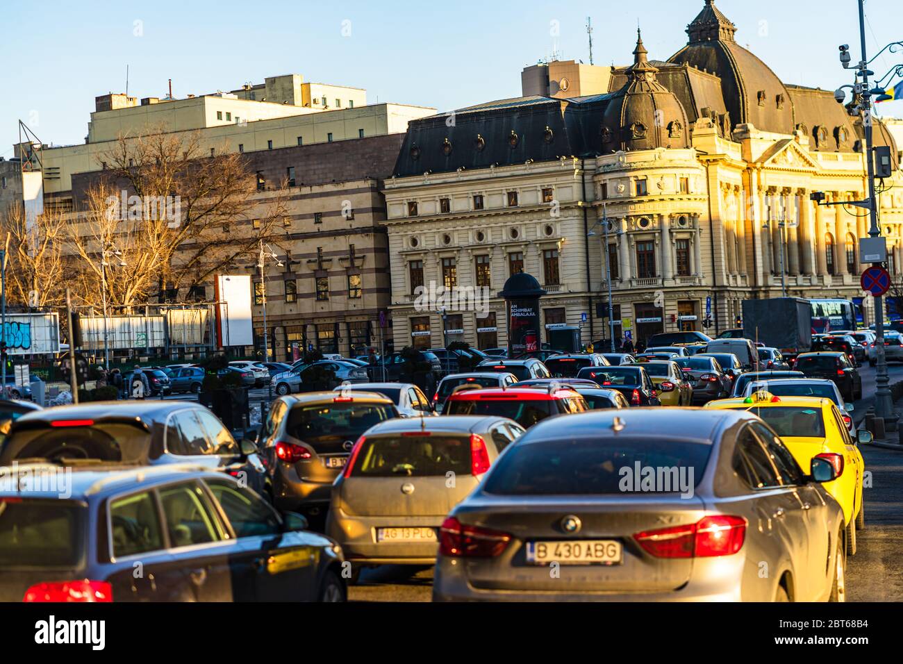 Car traffic at rush hour in downtown area of the city. Car pollution ...
