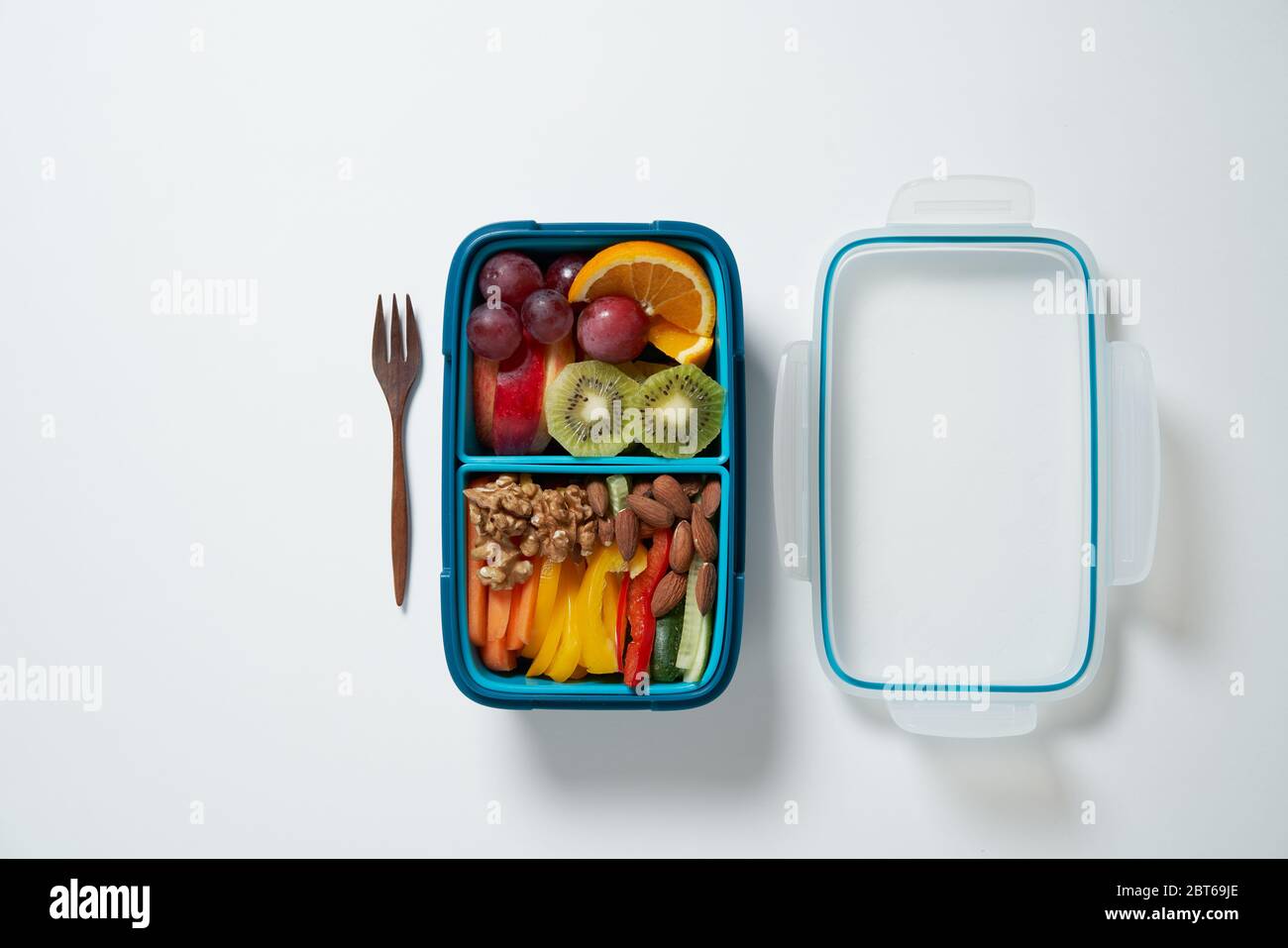 Top View of Full Lunch Box with Fuits, Vegetables and nuts. Healthy ...