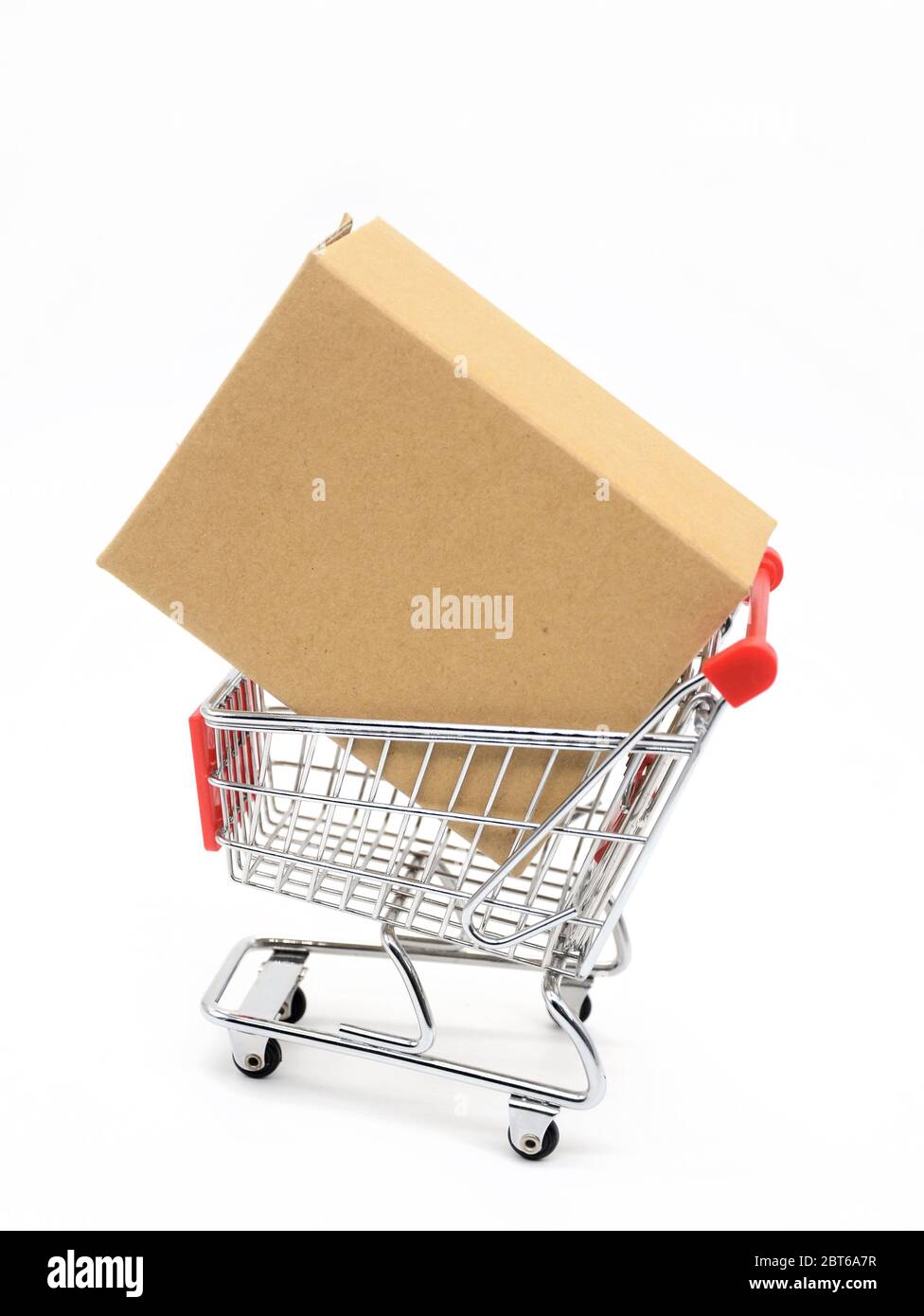 shopping cart with carton package Stock Photo - Alamy