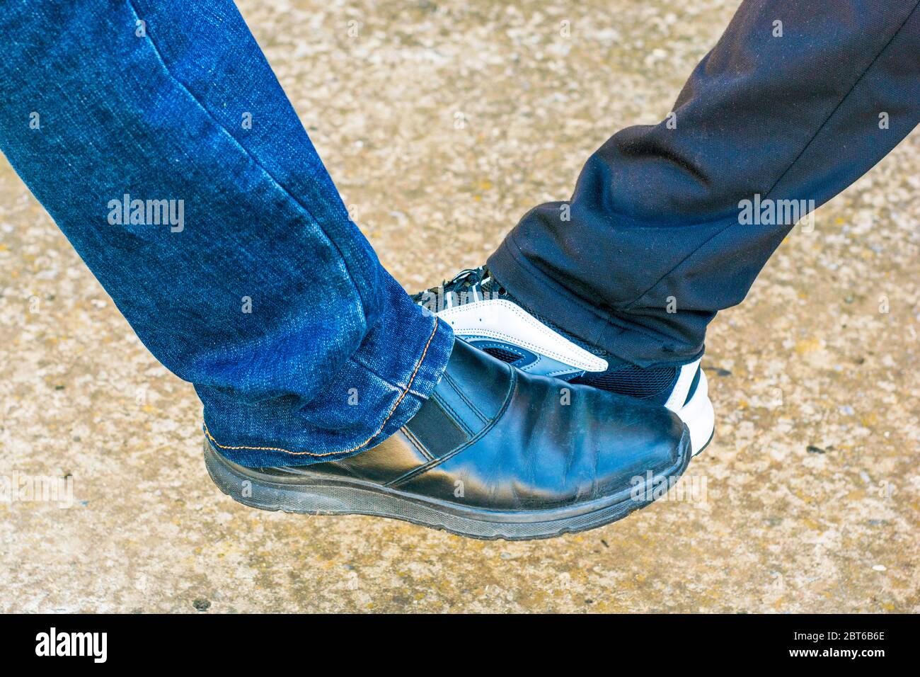 safe pandemic greeting concept two legs touching each other Stock Photo ...
