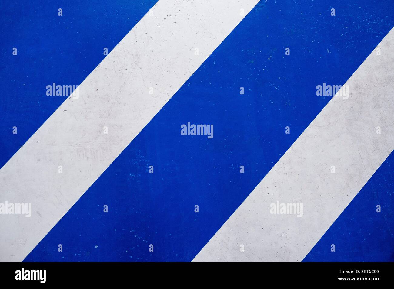 Blue and white colored safety lines textured background Stock Photo - Alamy